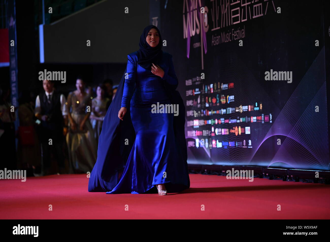 Malaysian singer-songwriter Shila Amzah poses as she arrives on the red ...