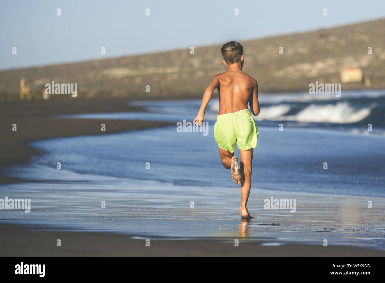 Teen boy running runs hi-res stock photography and images - Alamy