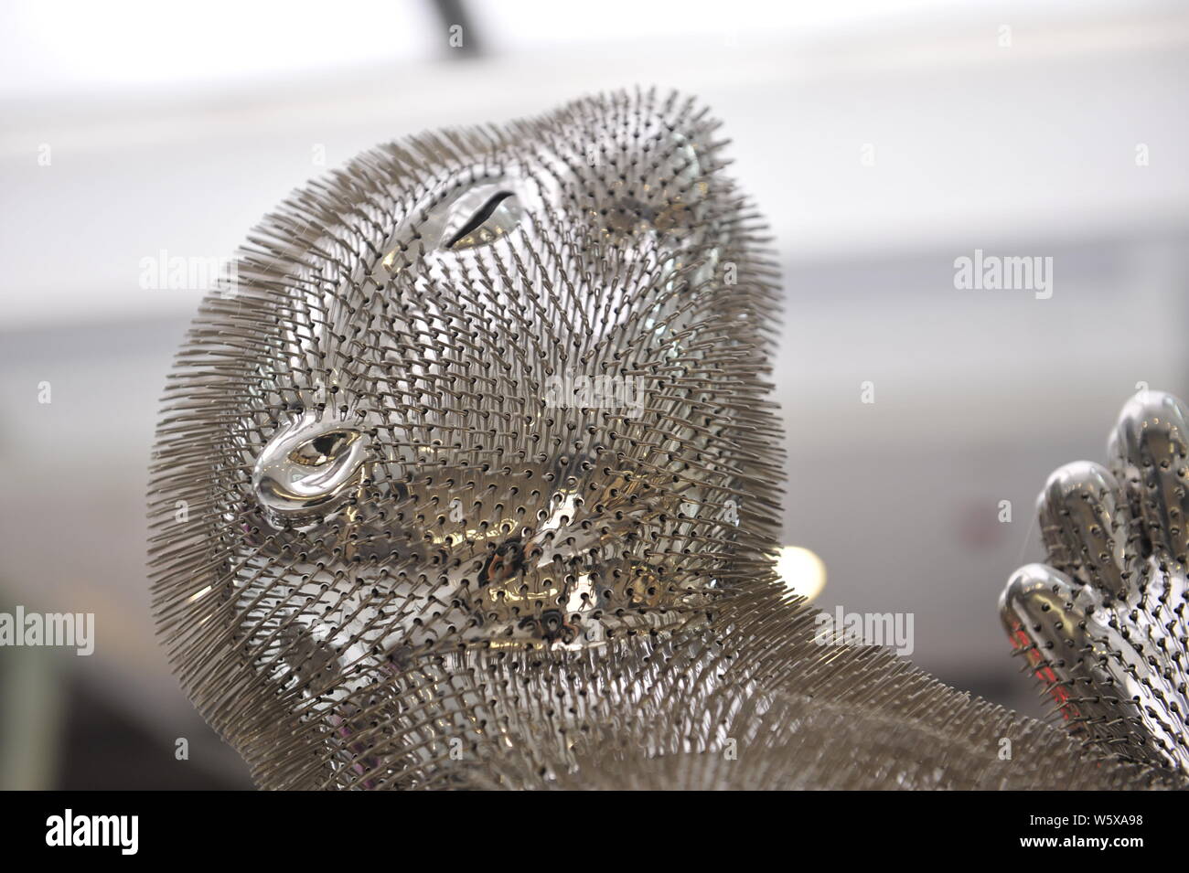 A vivid animal-shaped sculpture made out of sewing needles are ...