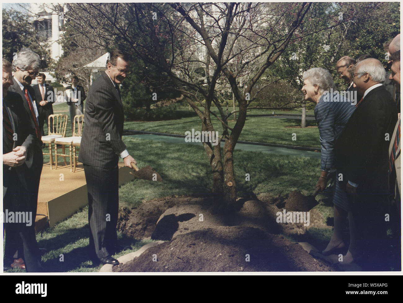 President and Mrs. Bush participate in a tree planting ceremony on the ...