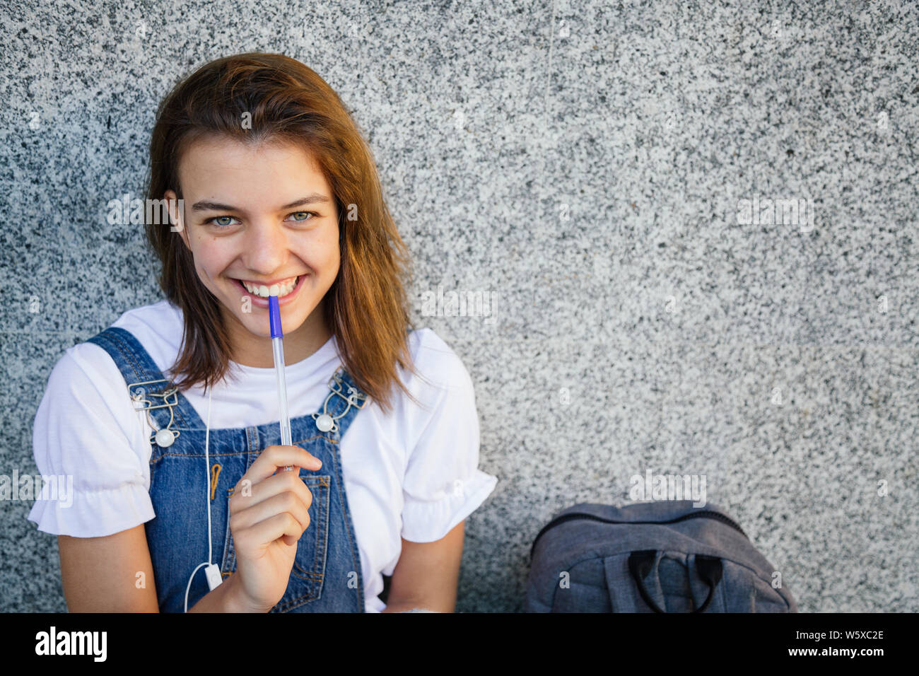 Biting pen hi-res stock photography and images - Alamy