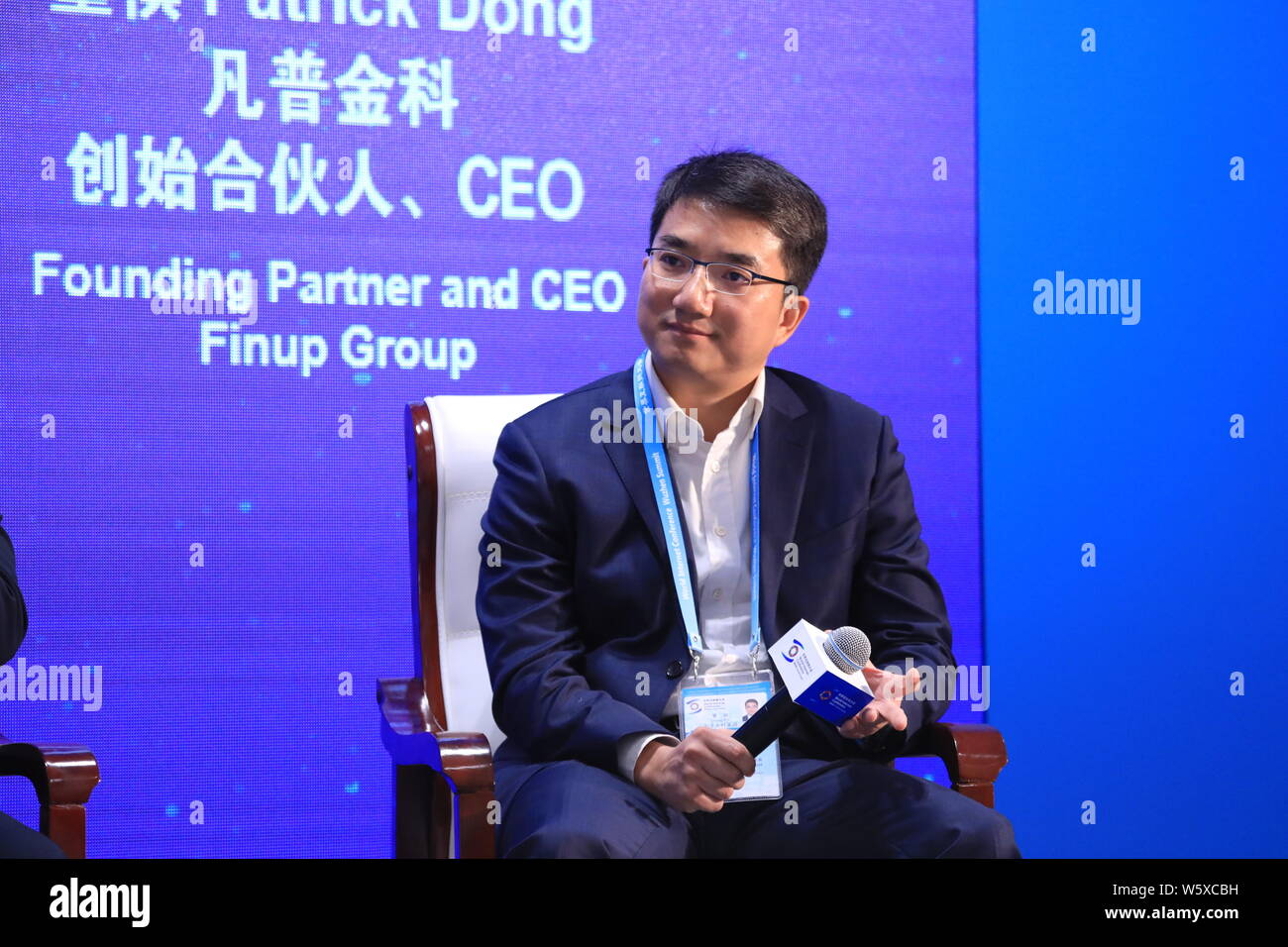 Dong Qi, Founding Partner and CEO Finup Group, attends a sub-forum of ...
