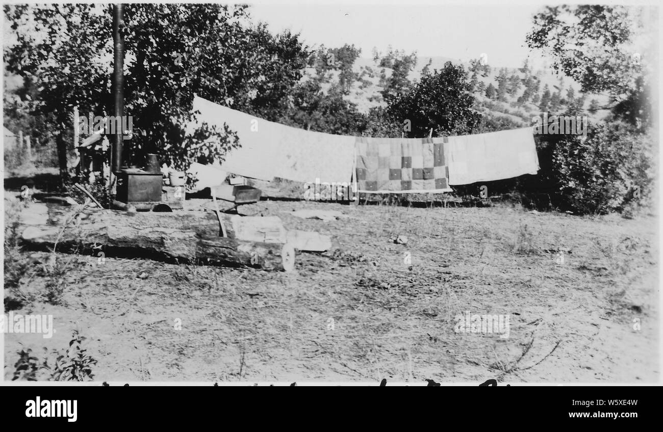 Quilts on a clothes line Stock Photo - Alamy