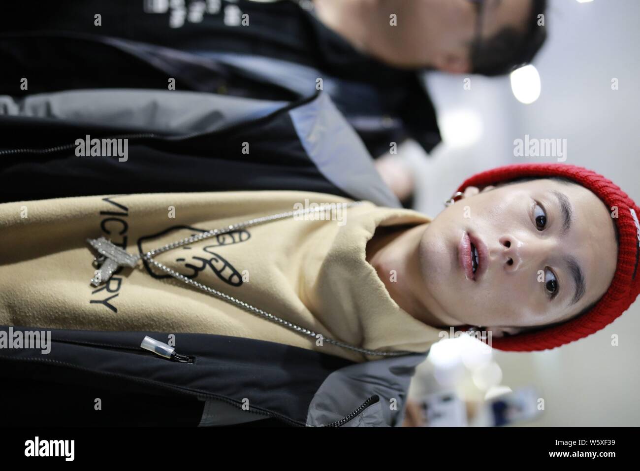 Chinese actor Dylan Wang Hedi, center, of the new lineup of Chinese boy ...