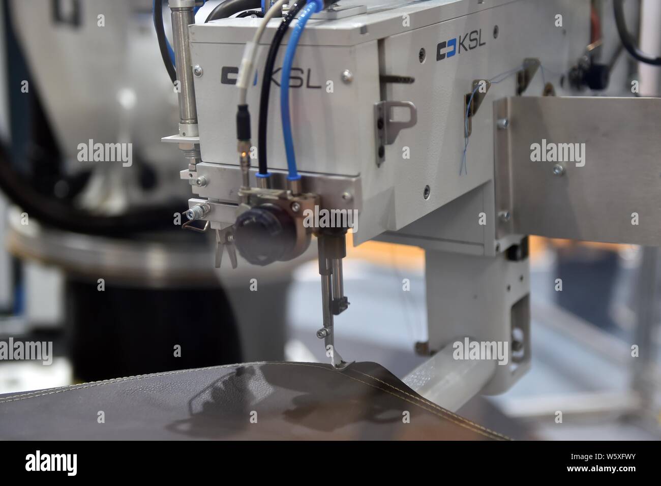 View of the KSL Robot sewing machine on display during the First China ...