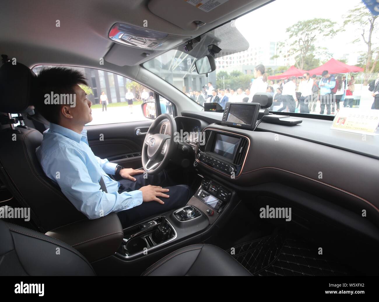 China's first self-driving taxi developed by Guangzhou major public ...