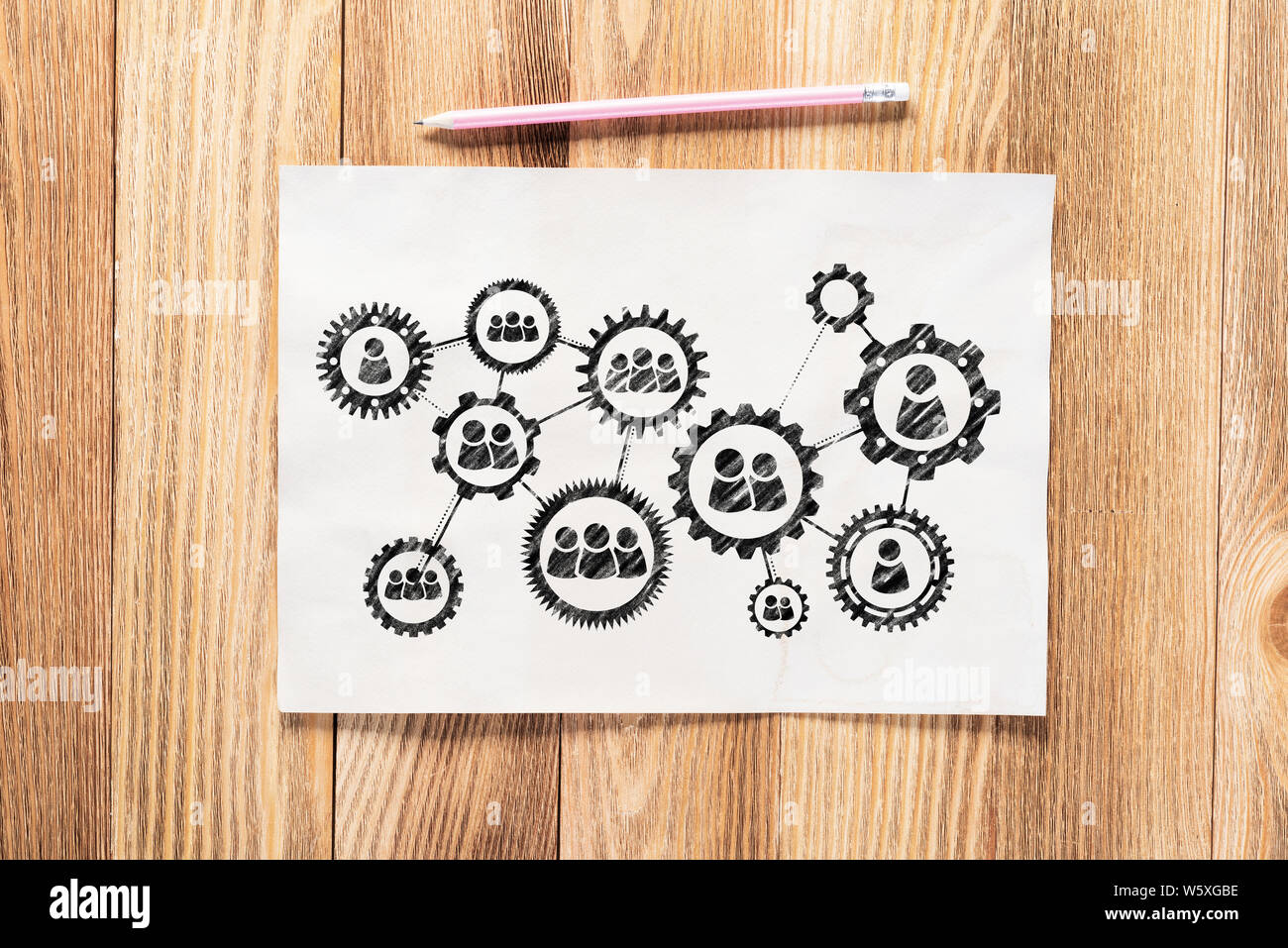 Business process management pencil hand drawn with group of rotating ...