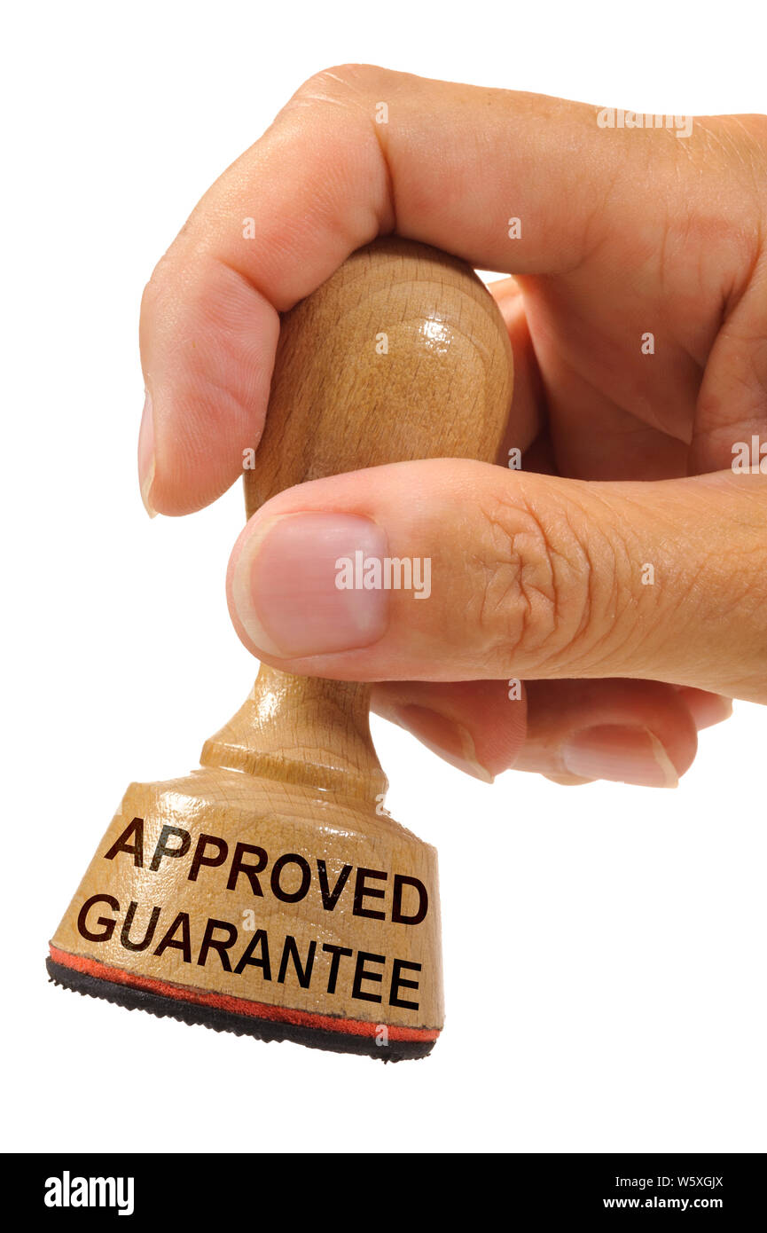 approved guarantee printed on rubber stamp Stock Photo - Alamy