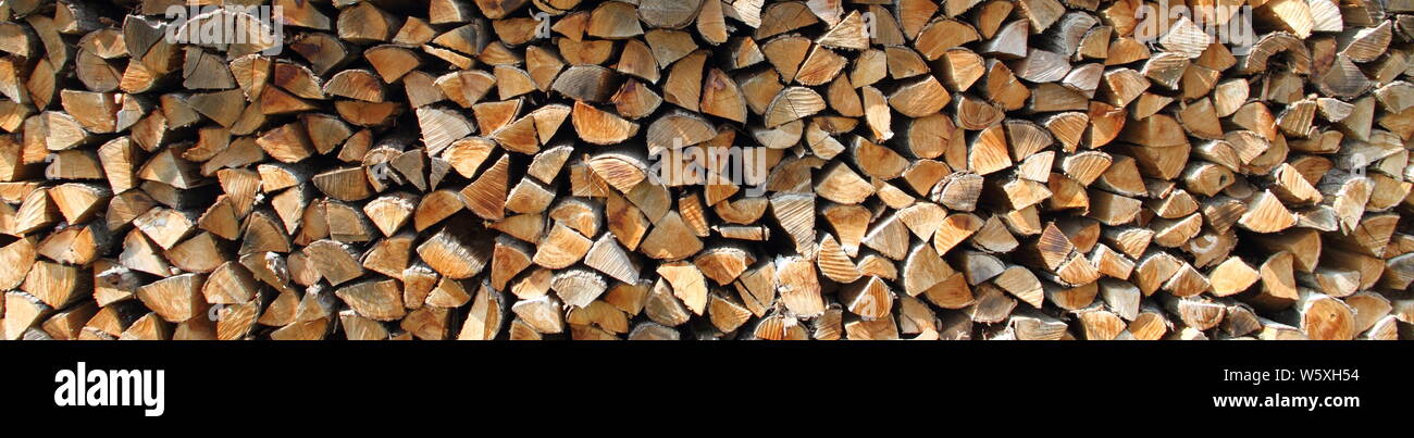 split dry firewood Stock Photo - Alamy