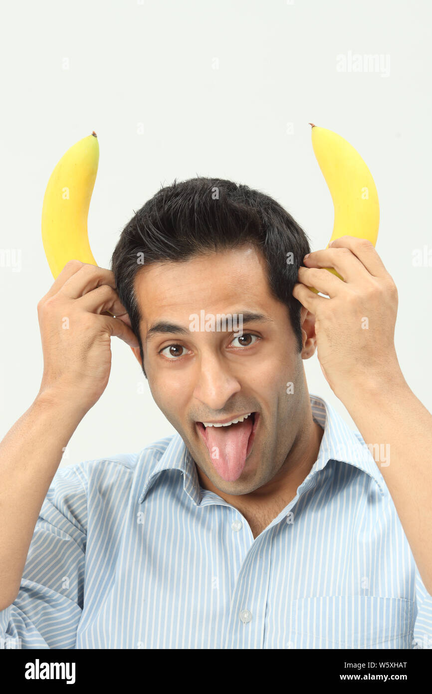 Funny man with banana hi-res stock photography and images - Alamy