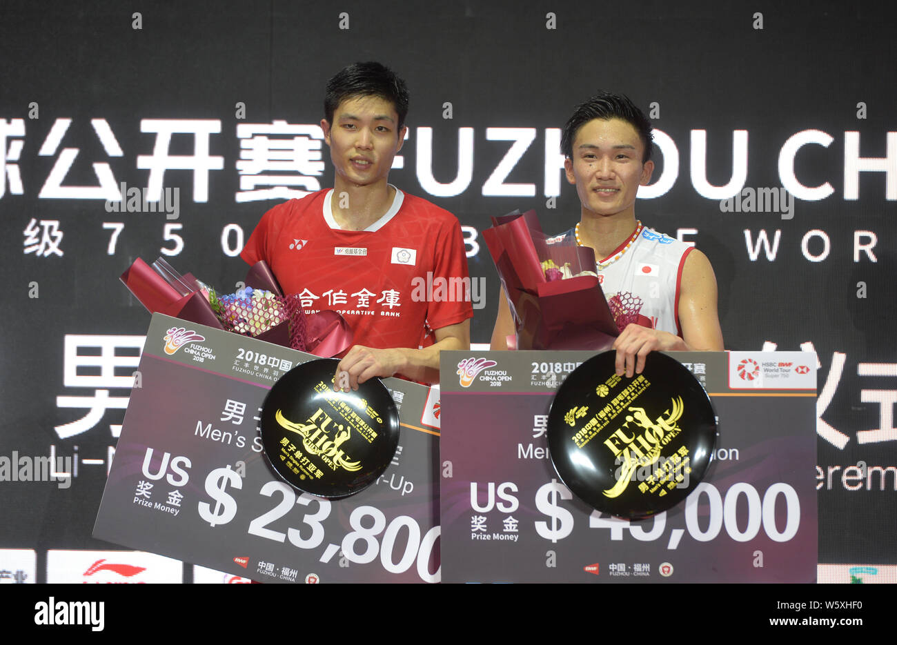 Winner Kento Momota of Japan, right, and first runner-up Chou Tien Chen ...