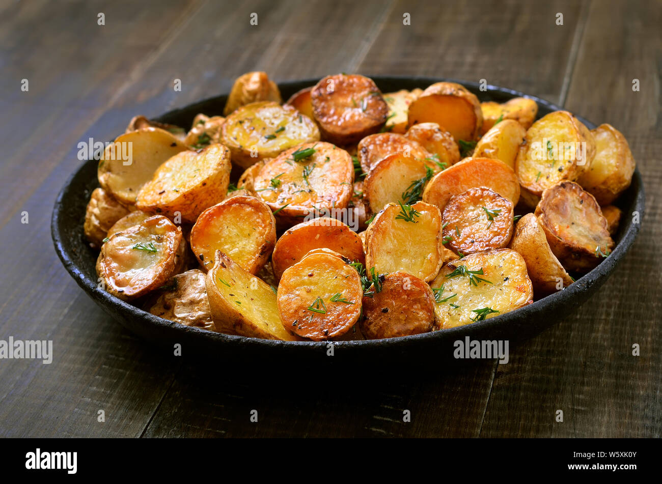 Sliced fried potatoes hi-res stock photography and images - Alamy