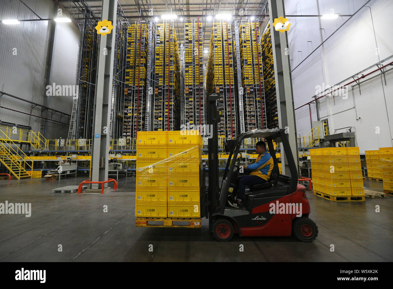 A Chinese worker transports parcels, most of which are from Singles ...