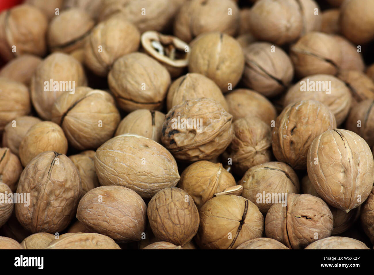 shelled walnut texture background. Heap of walnuts close up Stock Photo ...