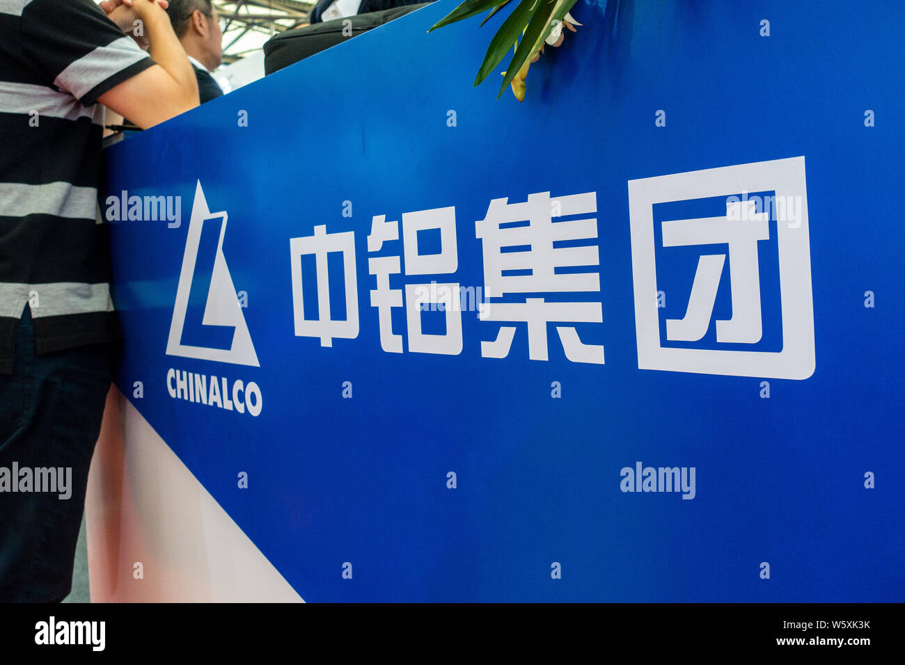 --FILE--People visit the stand of Chinalco (Aluminum Corporation of ...