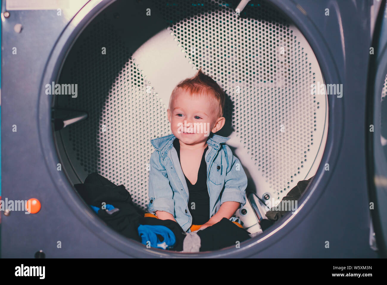 Head in clothes dryer hi-res stock photography and images - Alamy
