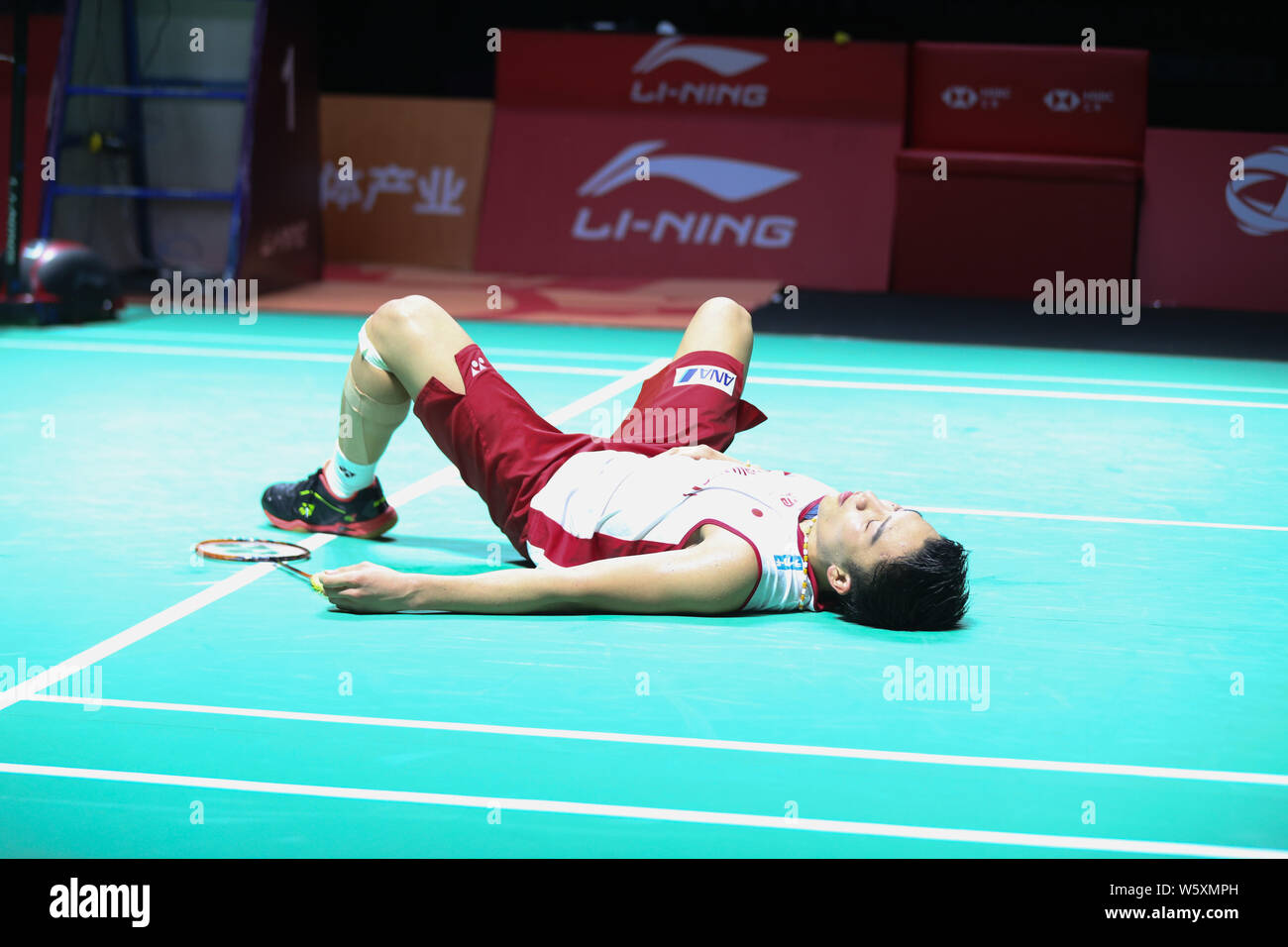 Kento Momota of Japan reacts after defeating Chou Tien Chen of Chinese ...