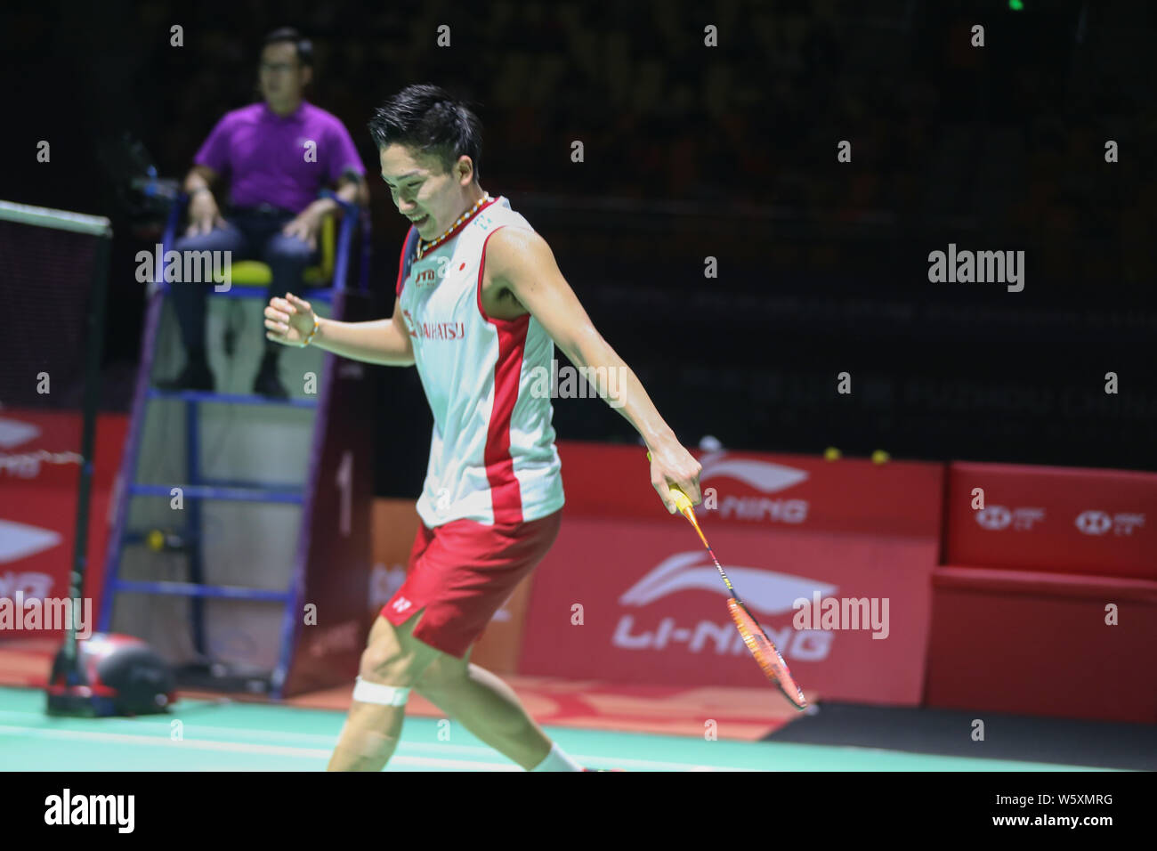 Kento Momota of Japan reacts after scoring against Chou Tien Chen of ...