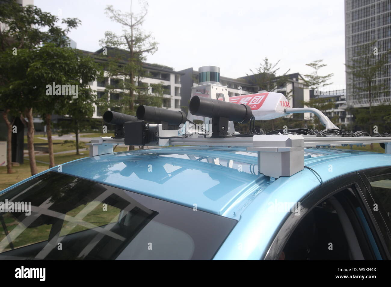 China's first self-driving taxi developed by Guangzhou major public ...