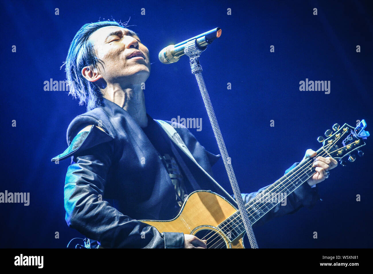 --FILE--Singer and actor Chen Yufan of Chinese pop duo Yu Quan performs ...