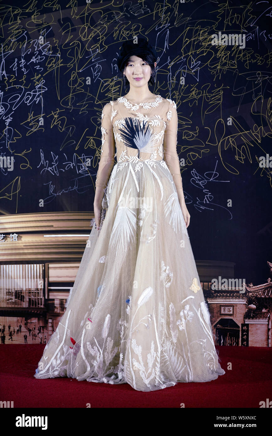 Chinese actress Zhou Dongyu arrives on the red carpet ceremony of the ...