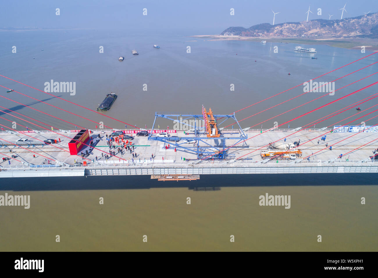 An aerial view of the construction site of the Poyang Lake No. 2 Bridge ...