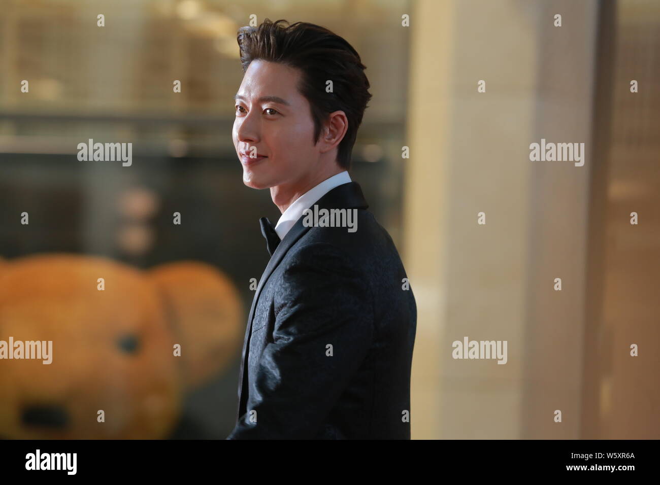 South Korean actor Park Hae-jin poses as he arrives on the red carpet ...