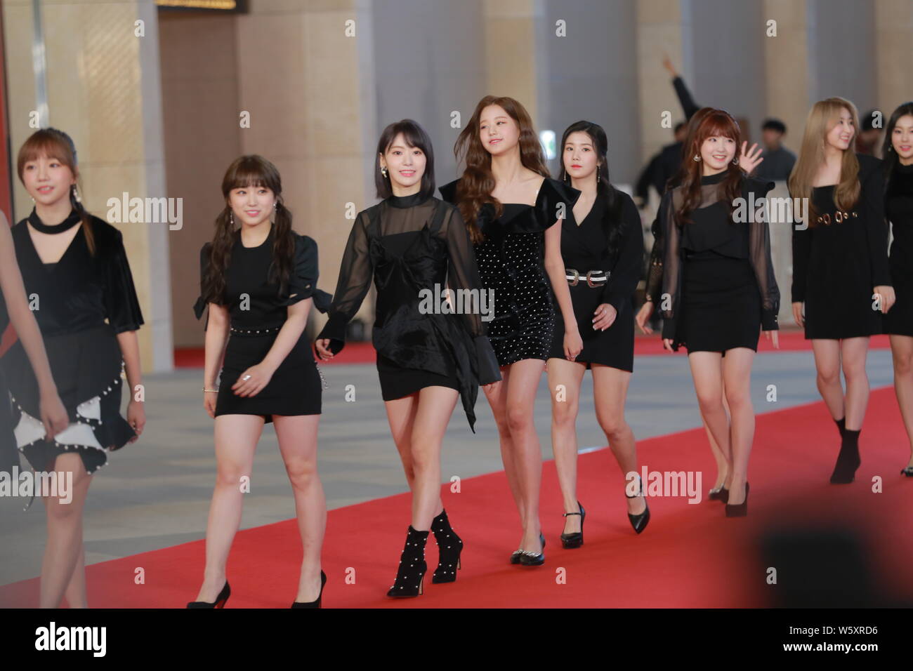 Members of South Korean girl group Izone, stylized as IZ*ONE, pose as ...