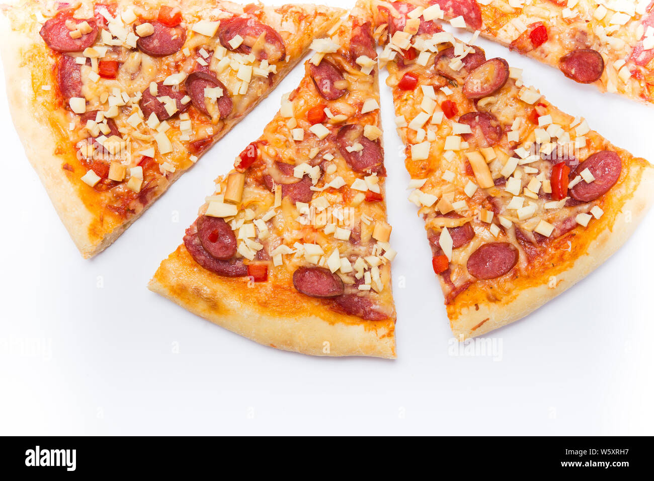 Pizza slice top view isolated on white background, with onions, bacon ...