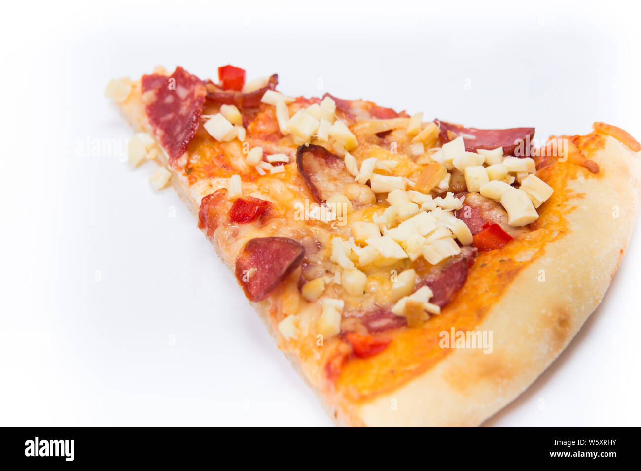 Pizza slice top view isolated on white background, with onions, bacon ...