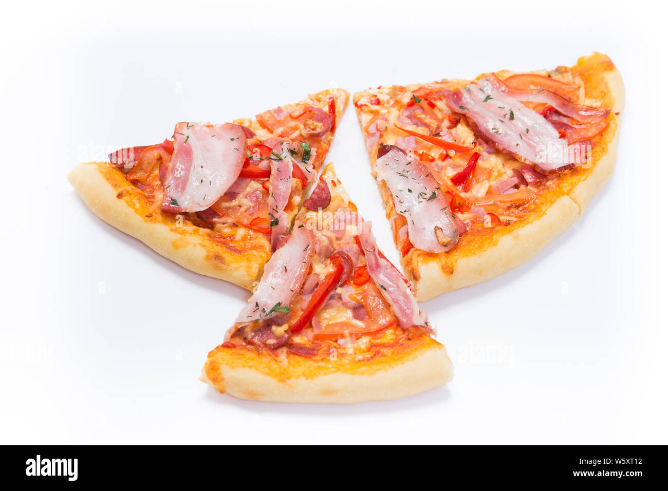 Pizza slice top view isolated on white background, with onions, bacon ...