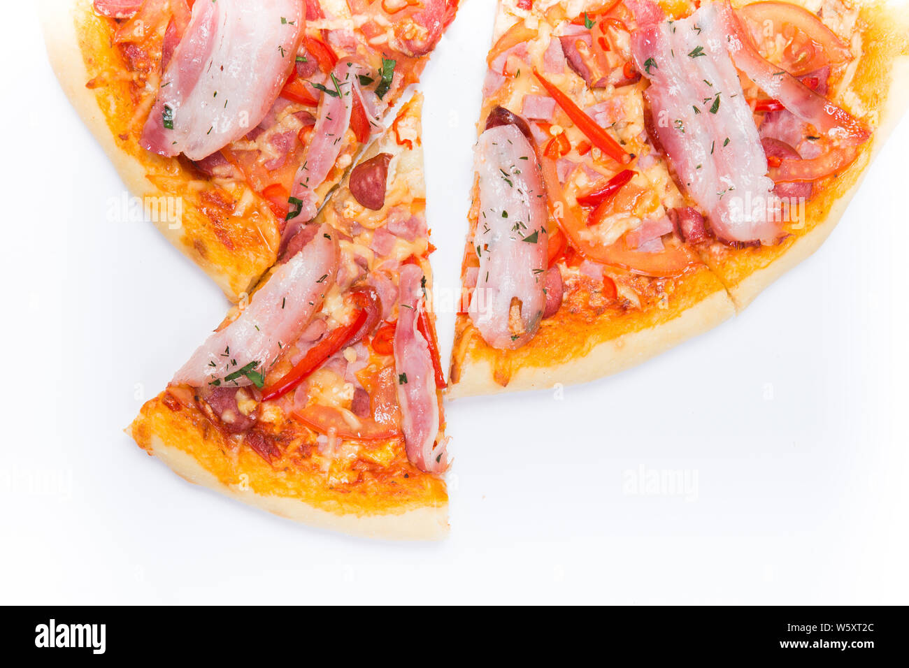 Pizza slice top view isolated on white background, with onions, bacon ...