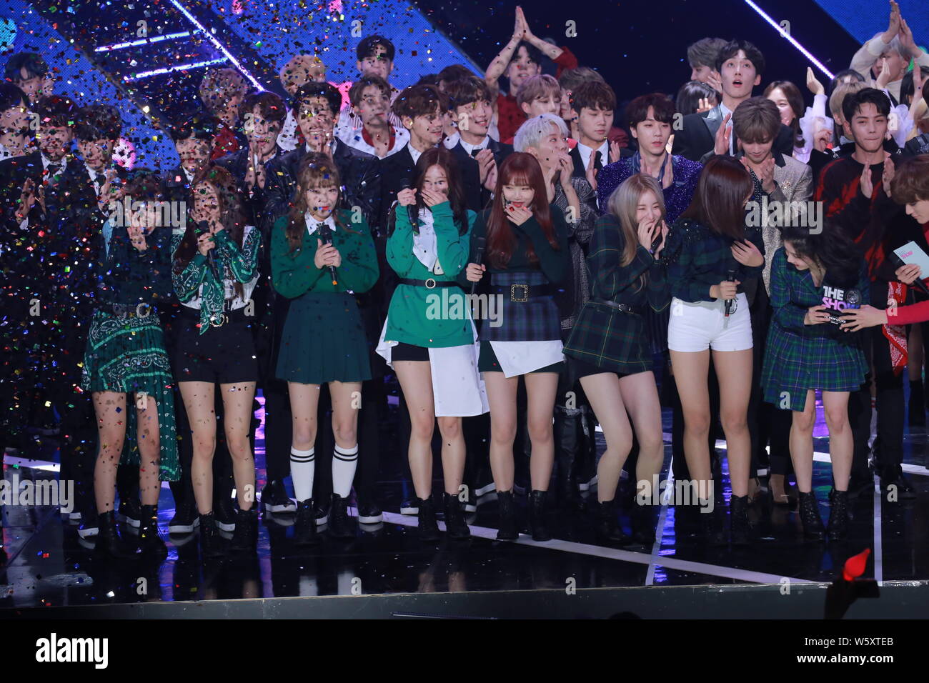 Members of South Korean girl group Izone, stylized as IZ*ONE, perform ...