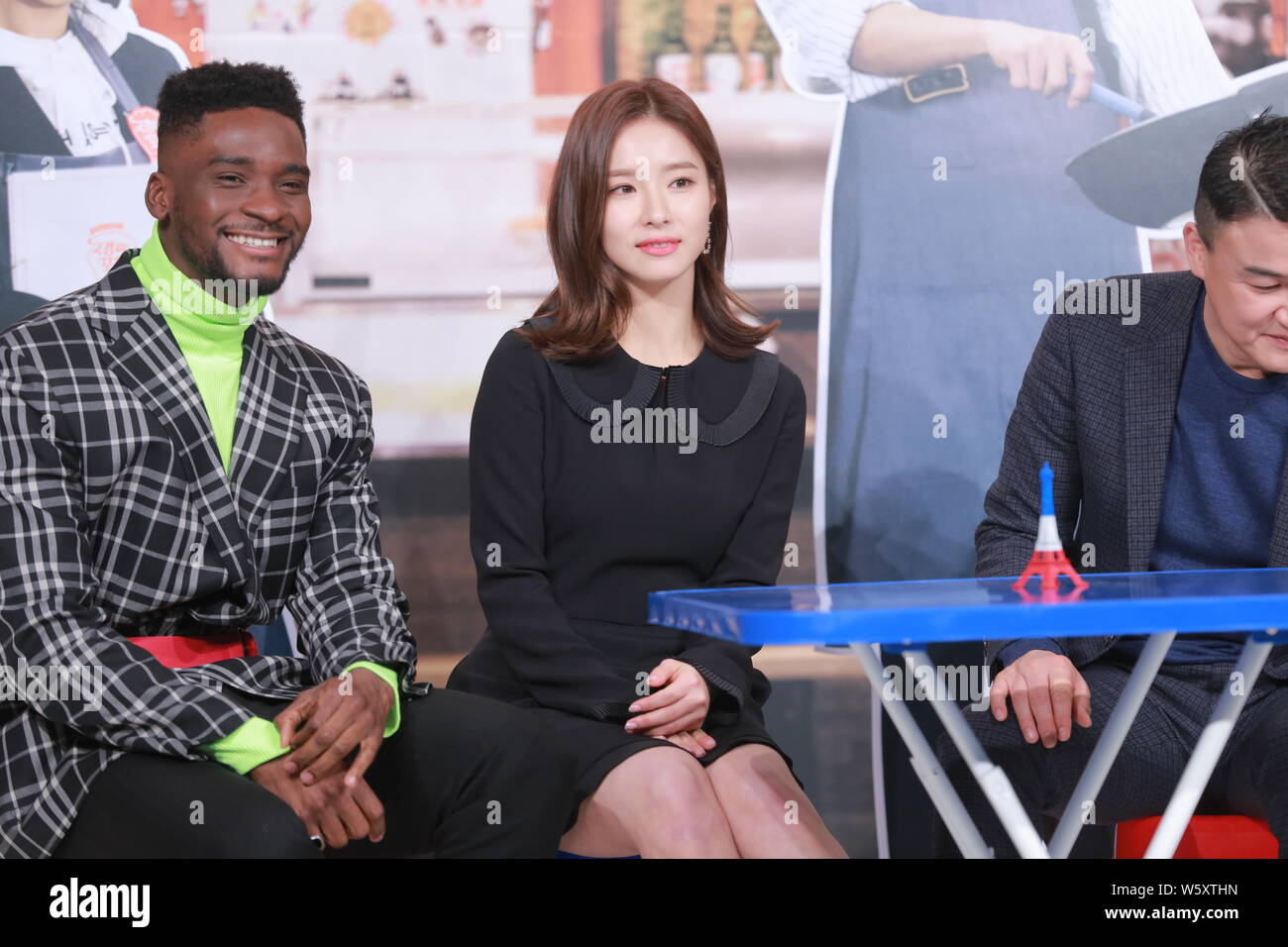 South Korean actress and singer Shin Se-kyung, center, attends a press ...