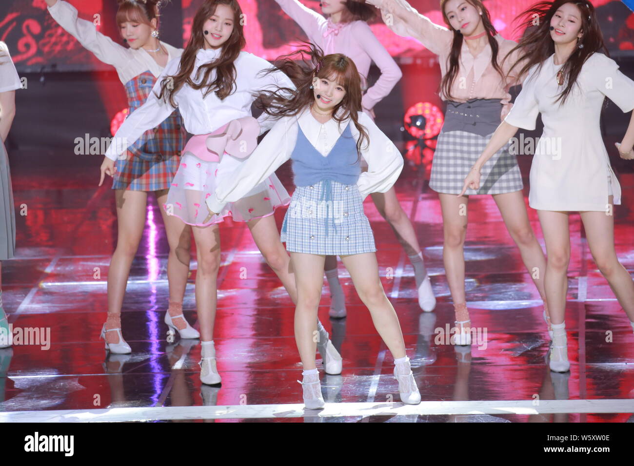 Members of South Korean girl group Izone, stylized as IZ*ONE, perform ...