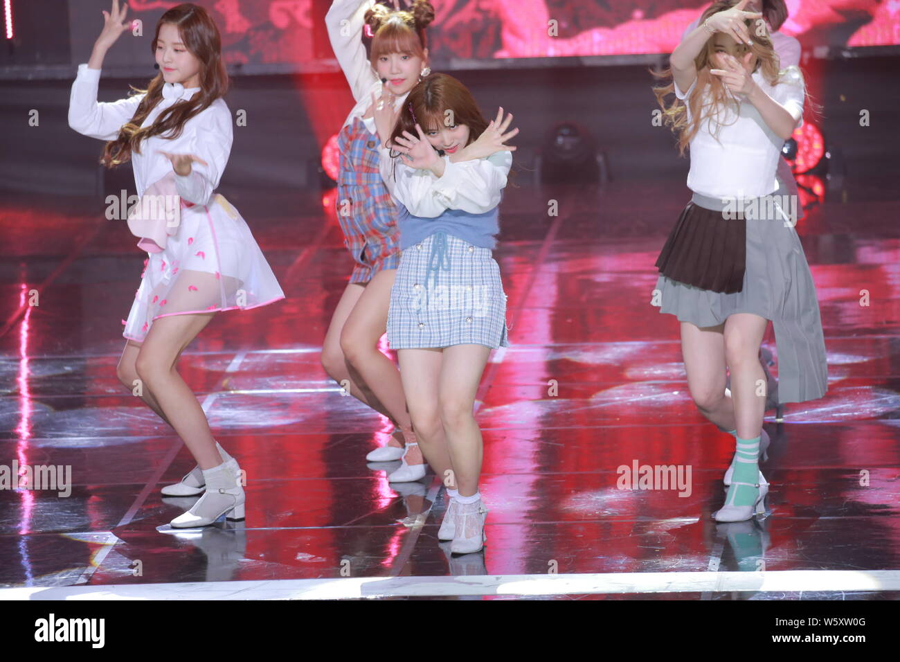 Members of South Korean girl group Izone, stylized as IZ*ONE, perform ...