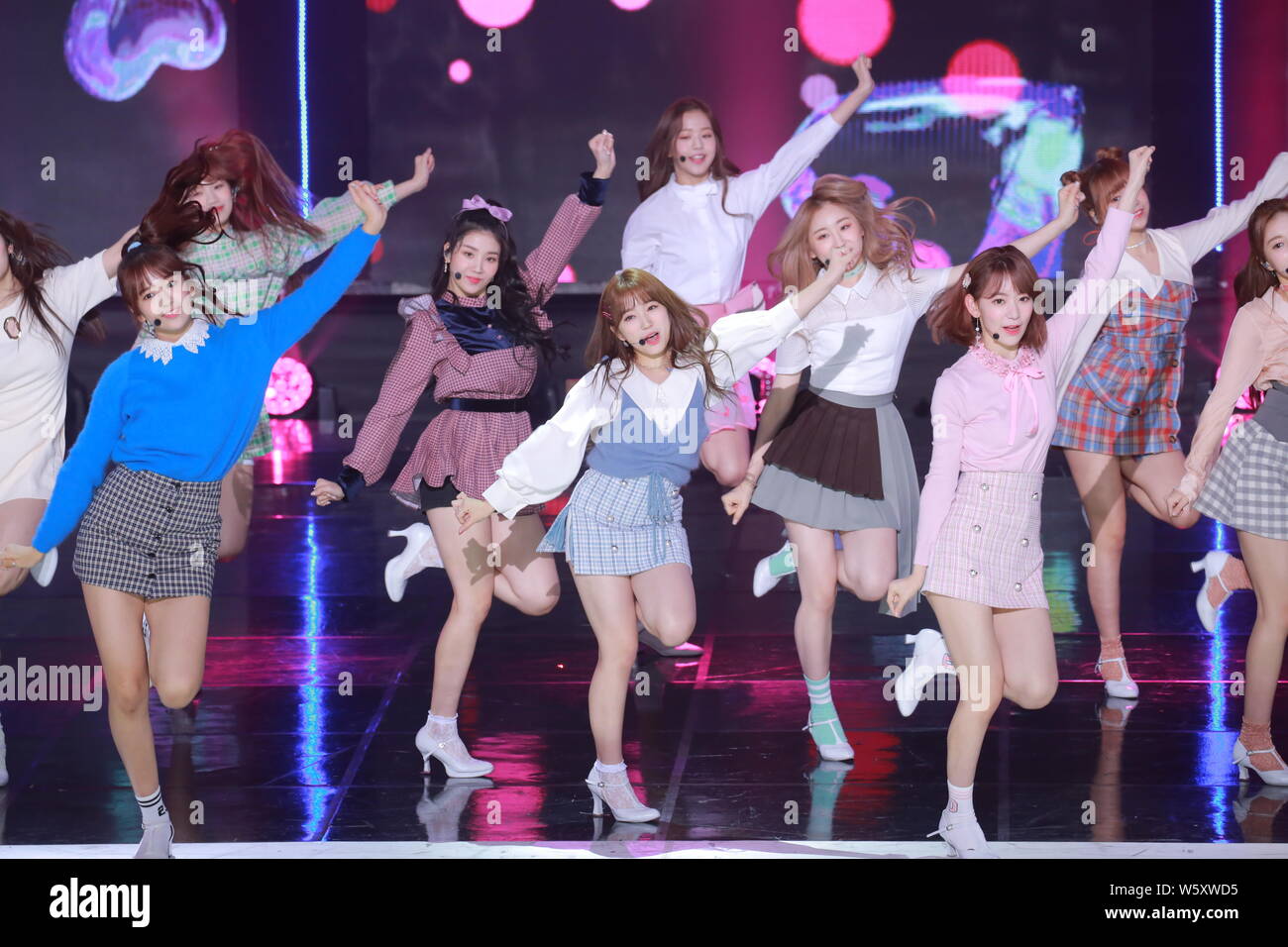 Members of South Korean girl group Izone, stylized as IZ*ONE, perform ...
