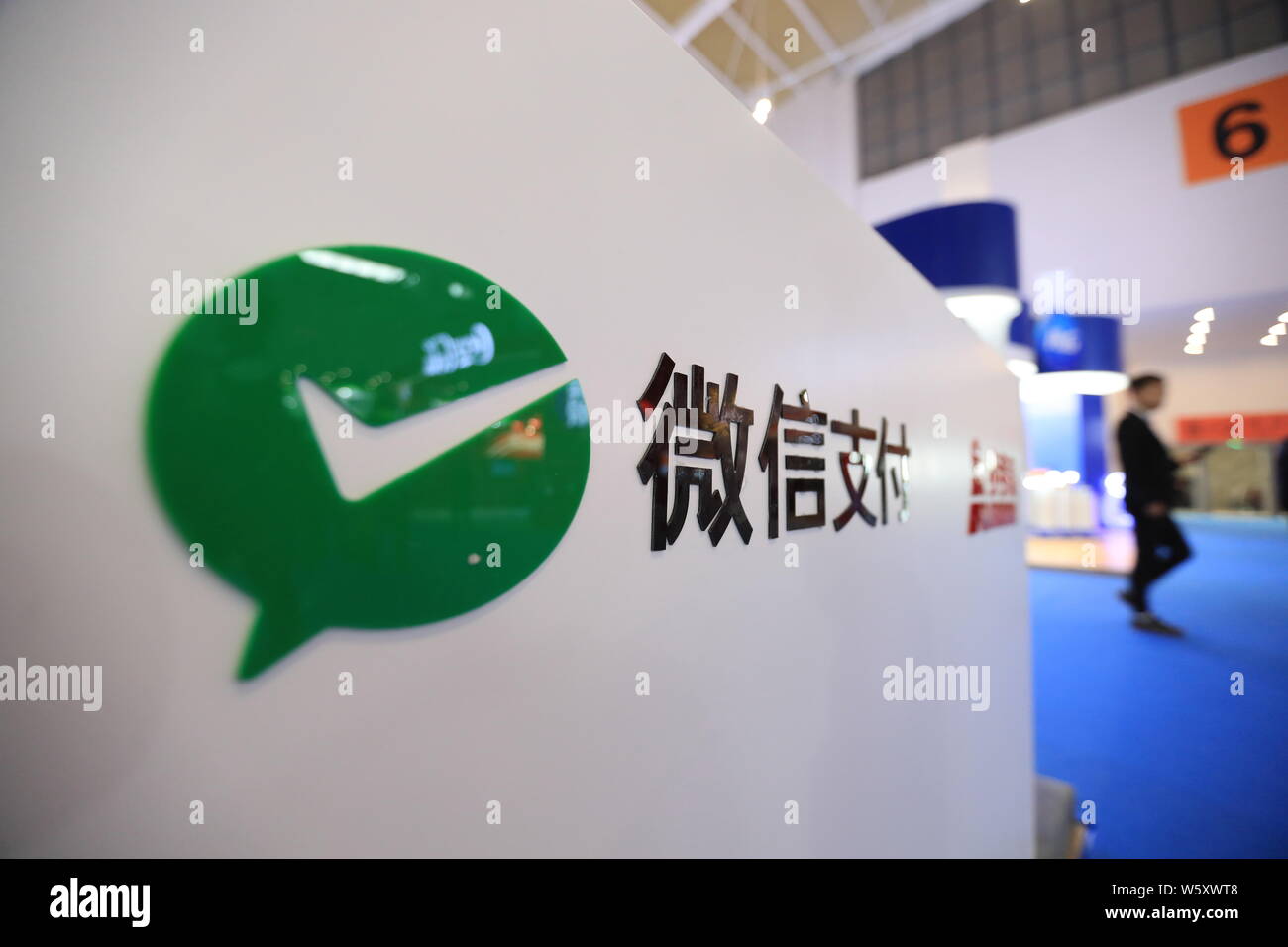 --FILE--A logo of WeChat Pay is seen at the stand of Tencent during an ...