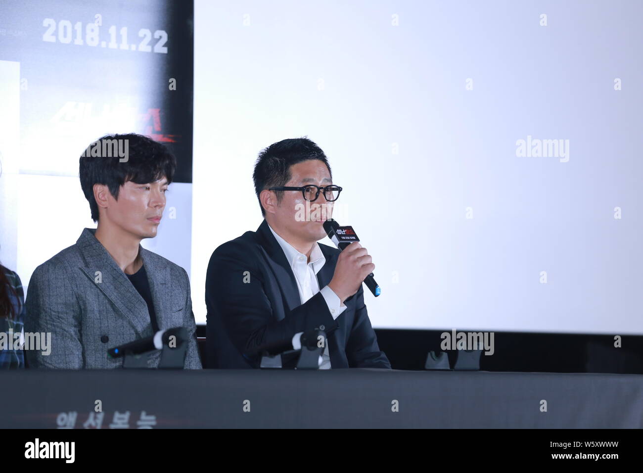 South Korean actor Kim Sung-oh, left, attends a press conference for ...