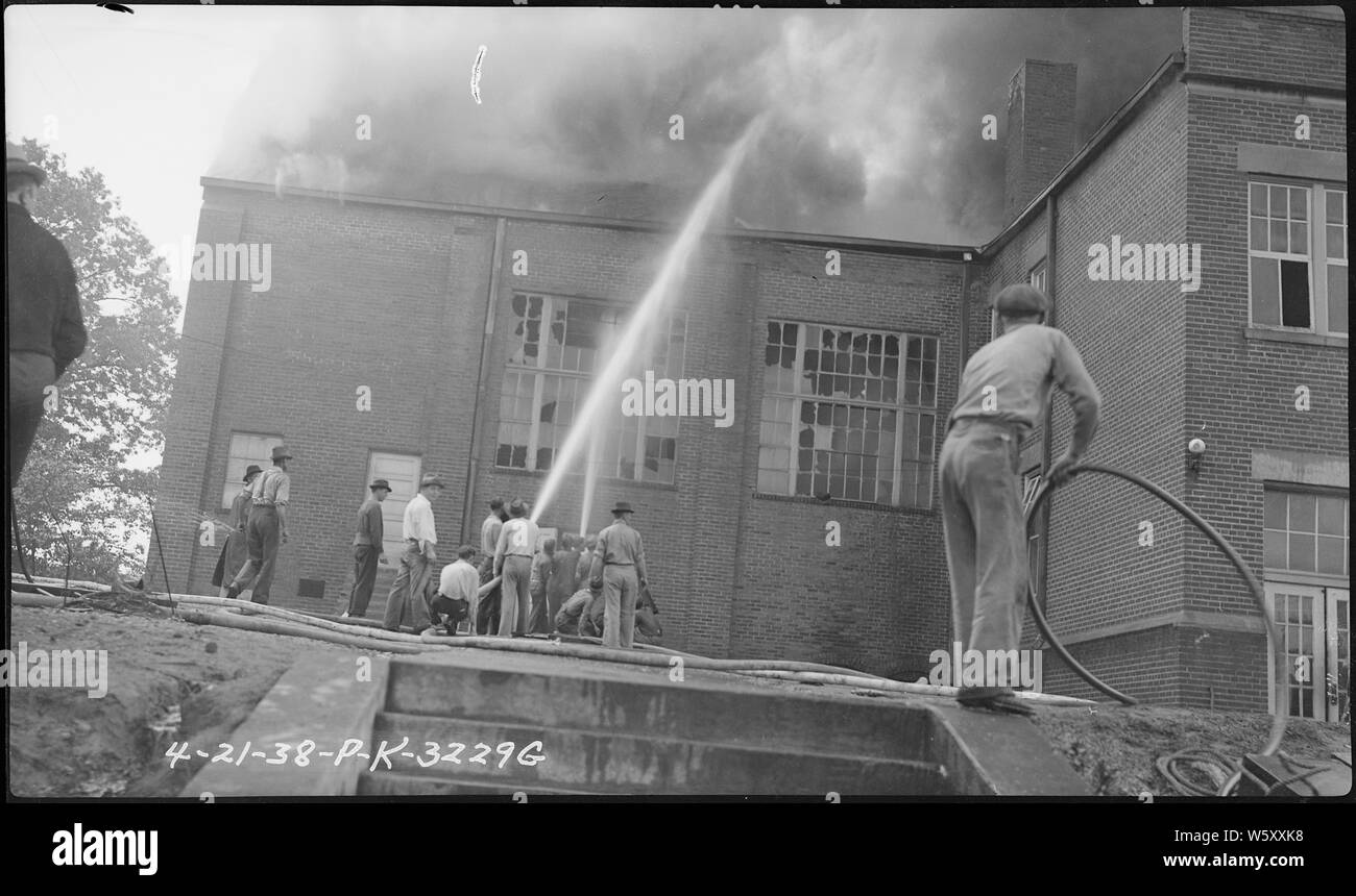 Sheffield High School fire with firefighters Stock Photo - Alamy