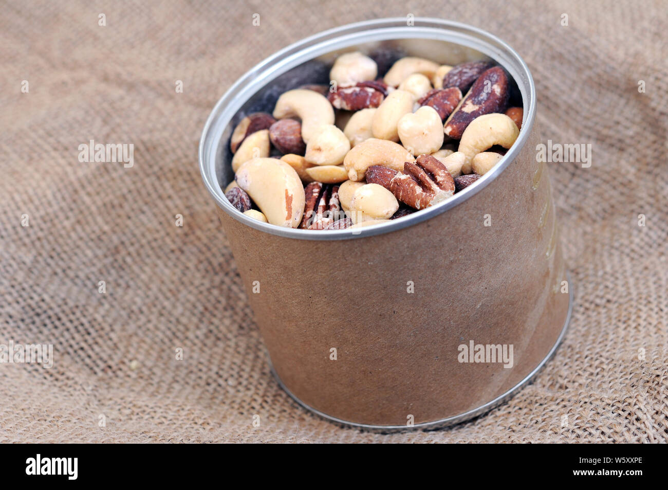 a can of nuts display in market place Stock Photo - Alamy