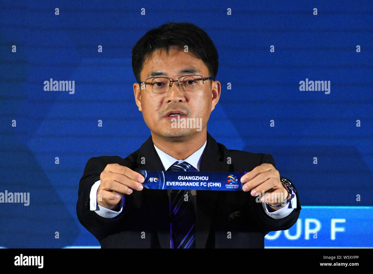 Shin Man Gil, Executive Director AFC Competitions Division, holds a ...