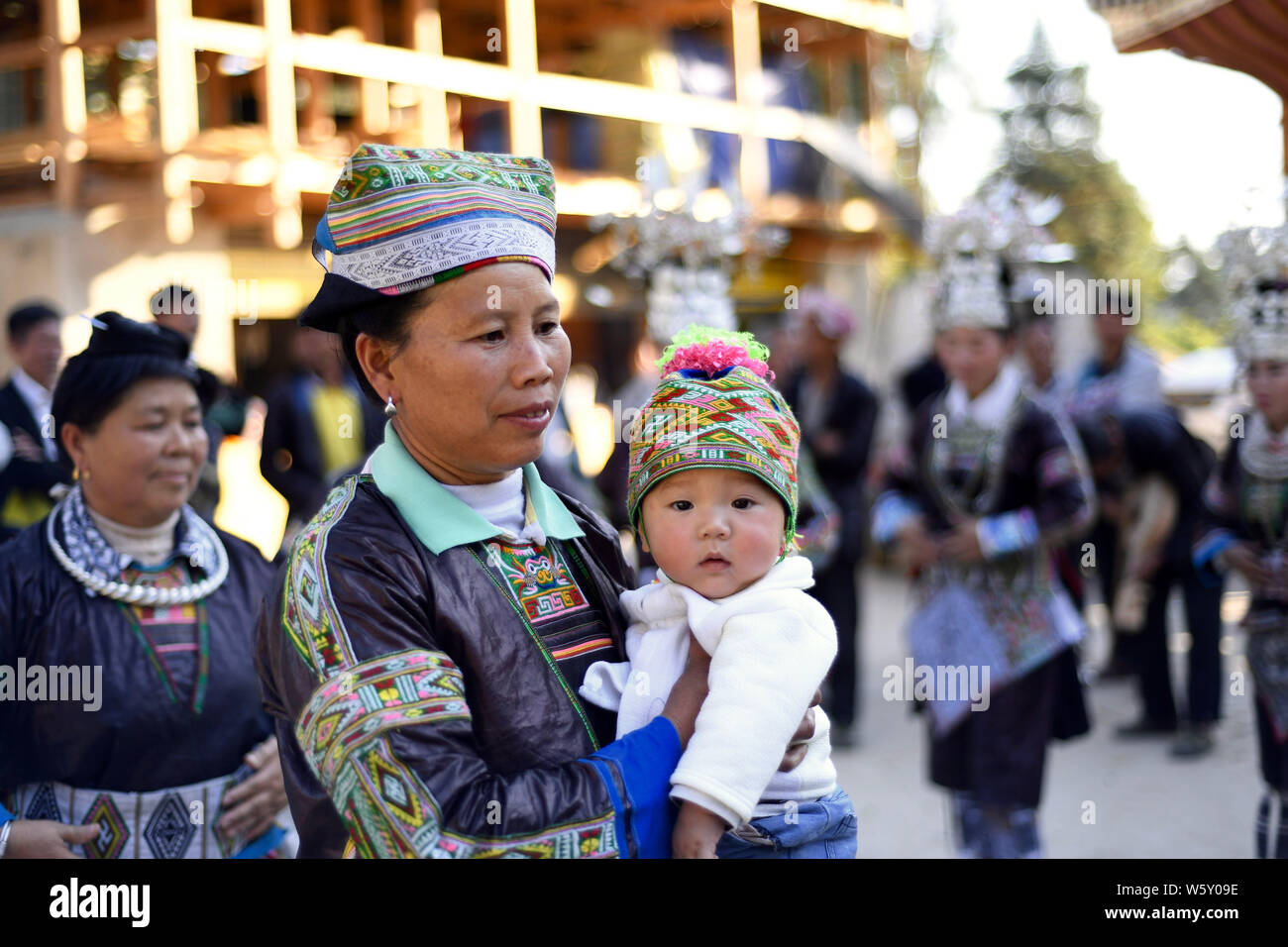 Chinese people of Miao ethnic group dressed in traditional silver ...