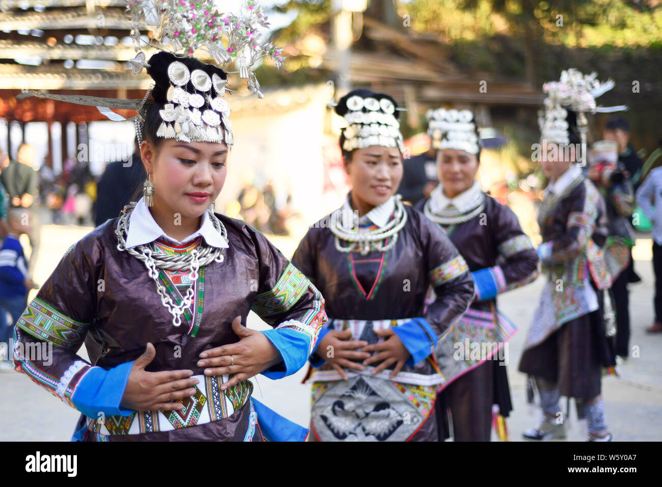 Chinese people of Miao ethnic group dressed in traditional silver ...