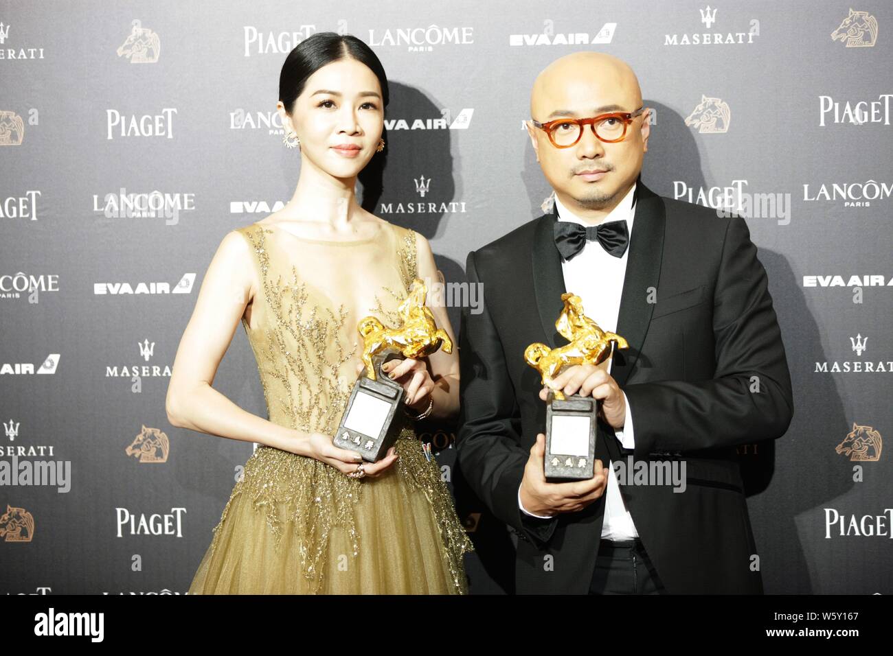 Taiwanese stage actress Hsieh Ying-xuan and Chinese actor Xu Zheng pose ...