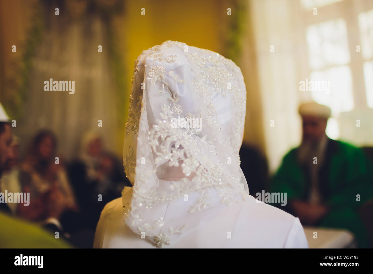 Bride and groom Asian Muslims marry in a beautiful red love theme ...