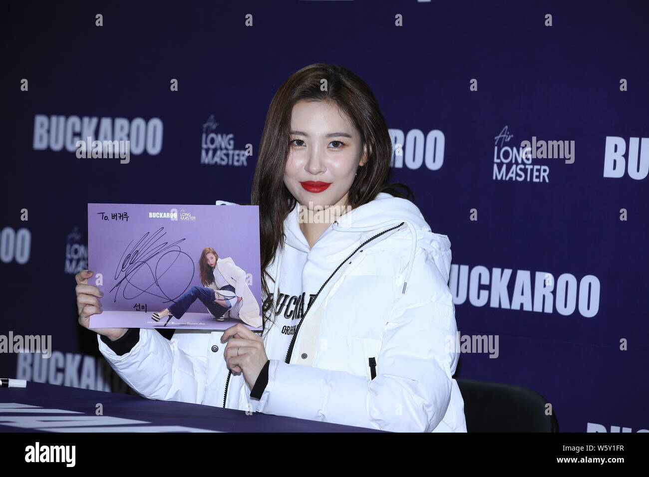 South Korean singer Lee Sun-mi, also known as Sunmi, attends a signing ...
