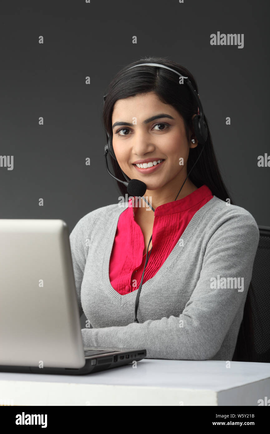 Indian Businesswoman Using Headset Laptop High Resolution Stock ...