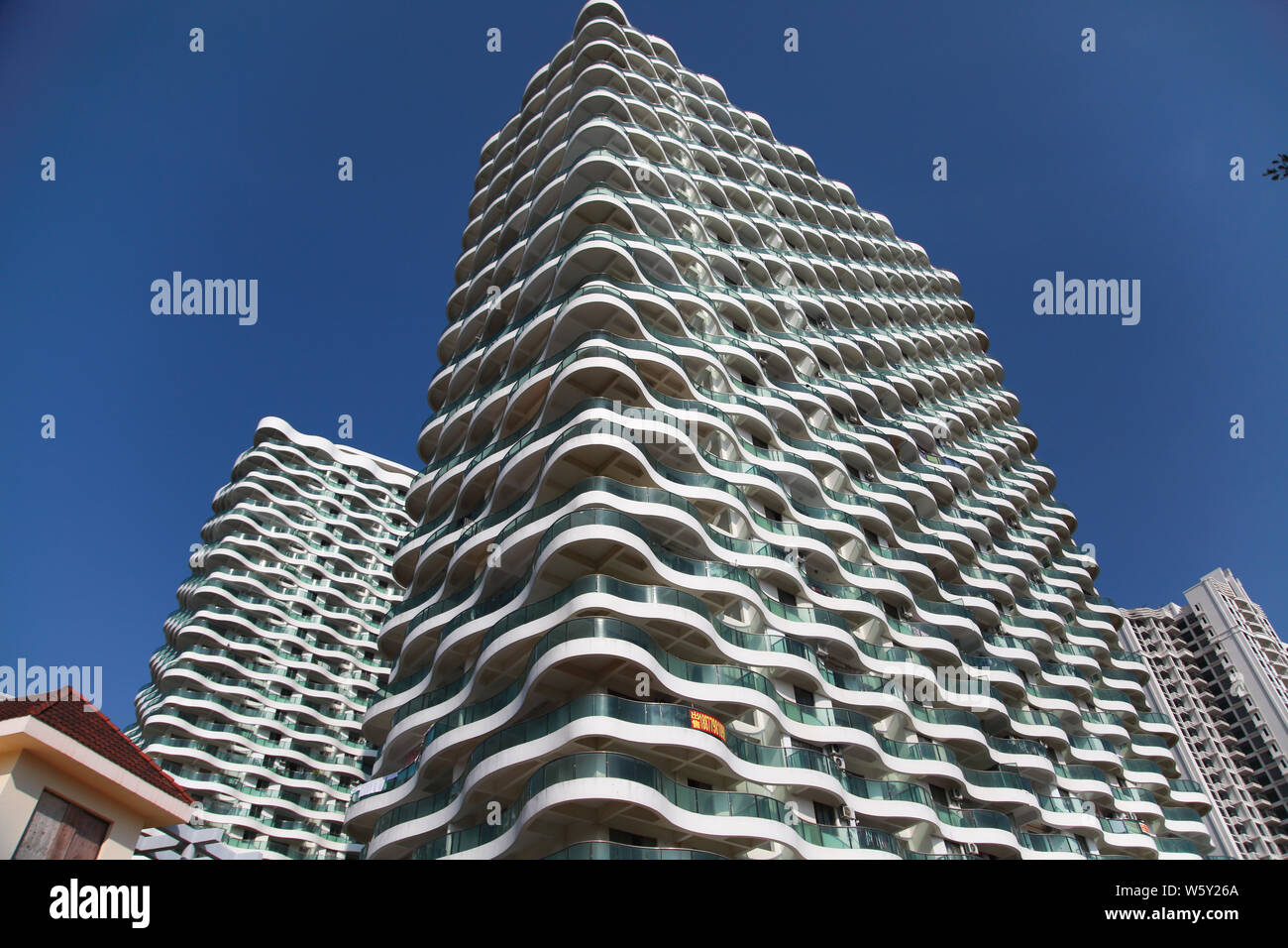 A view of two instant noodle-shaped high-rise residential apartment ...