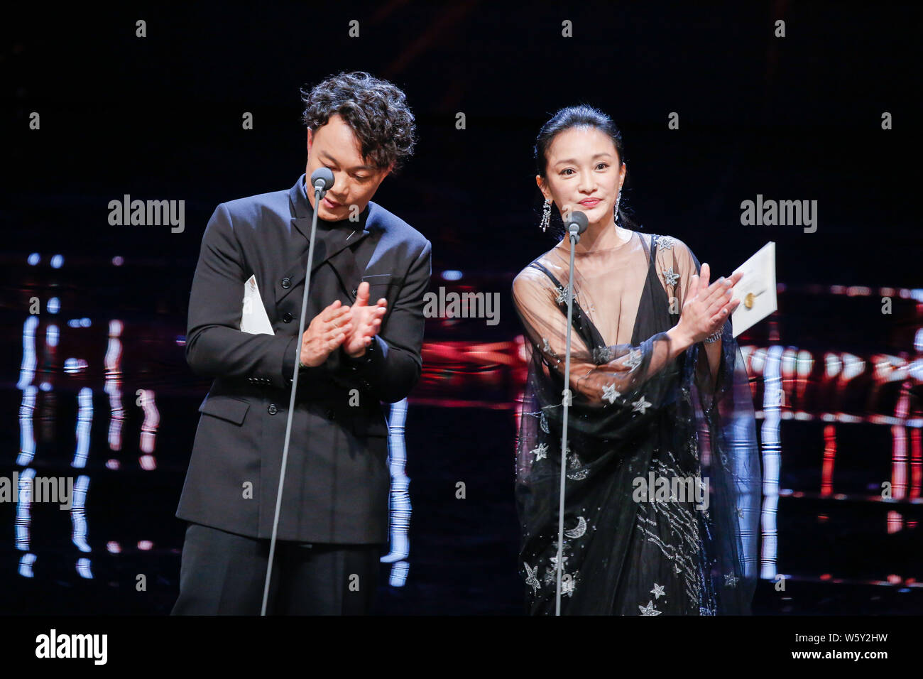 **TAIWAN OUT**Chinese actress Zhou Xun, right, and Hong Kong singer and ...